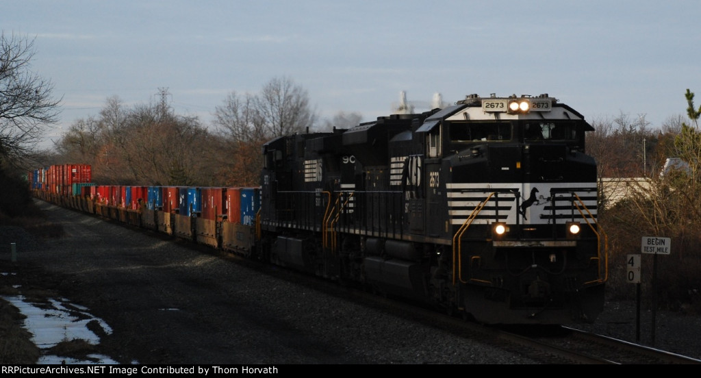 NS 22V is eastbound at LEHL MP 40 with its colorful COFCs